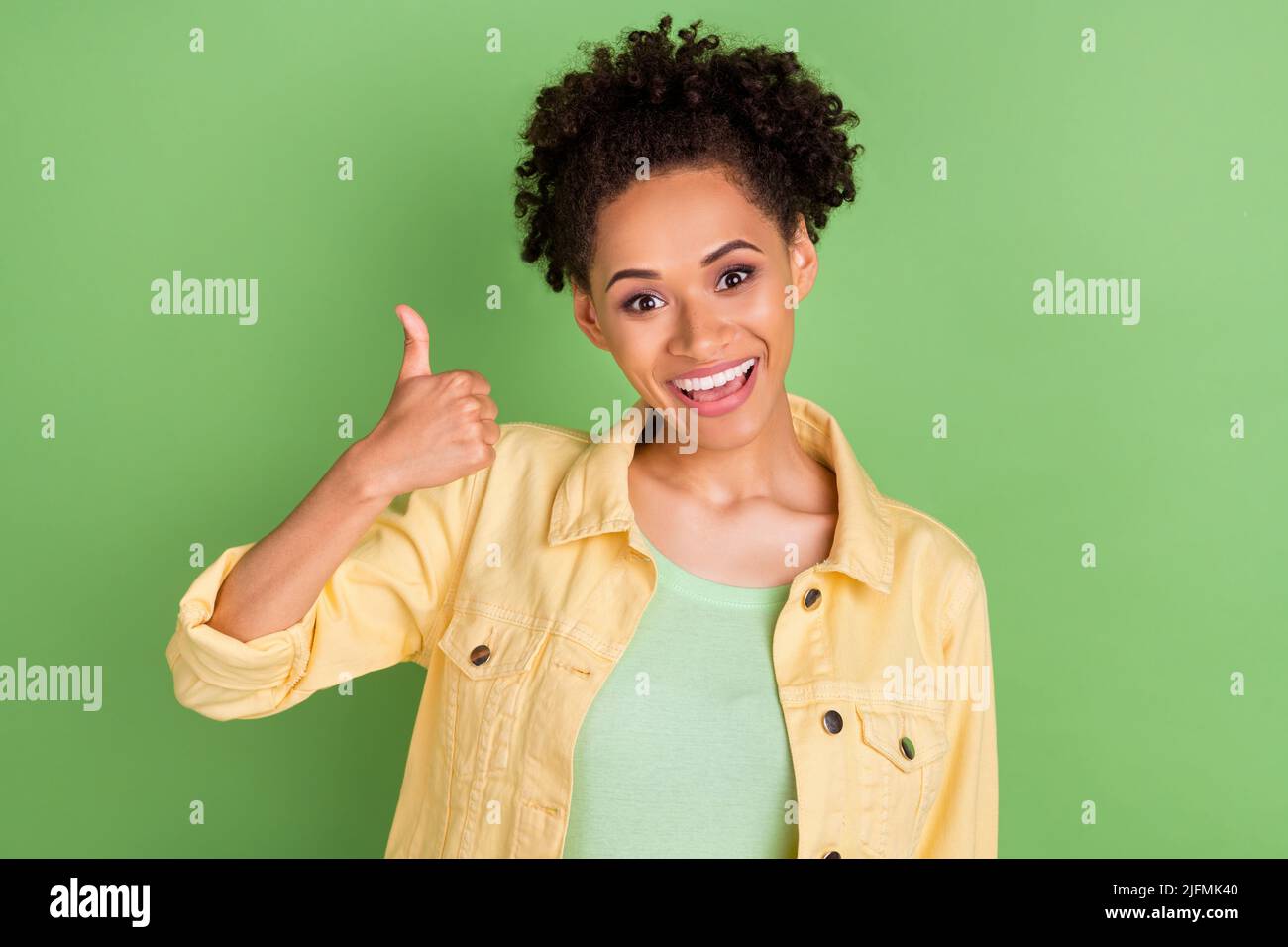 Photo Of Hooray Millennial Brunette Lady Thumb Up Wear Yellow Shirt
