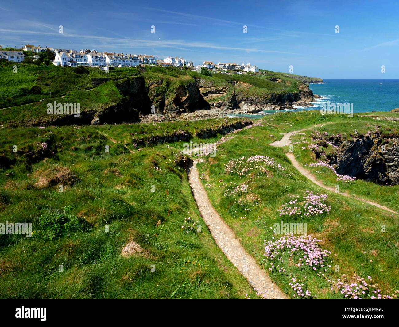 The cliff path near Port Gaverne, Cornwall, with Port Isaac in the ...