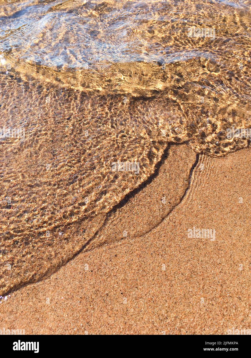 Sandy beach and transparent sea water. Summer natural background Stock ...