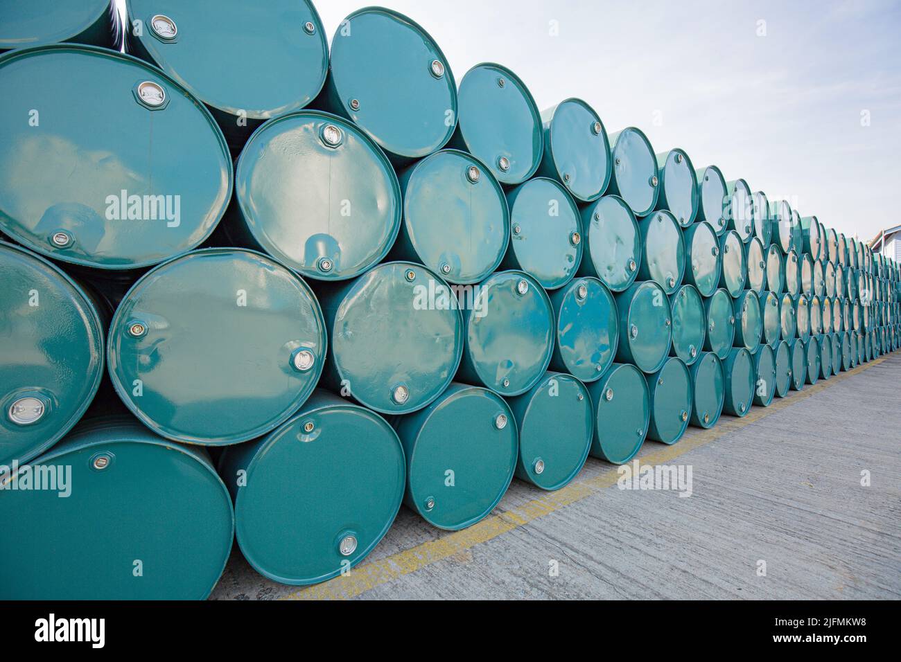 Oil barrels green or chemical drums horizontal stacked up Stock Photo ...