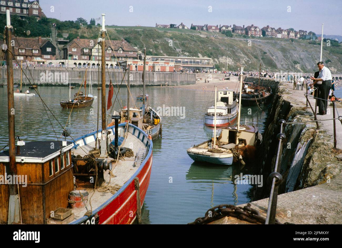 Boats in the harbour, Folkestone, Kent, England, UK early 1960s Stock ...