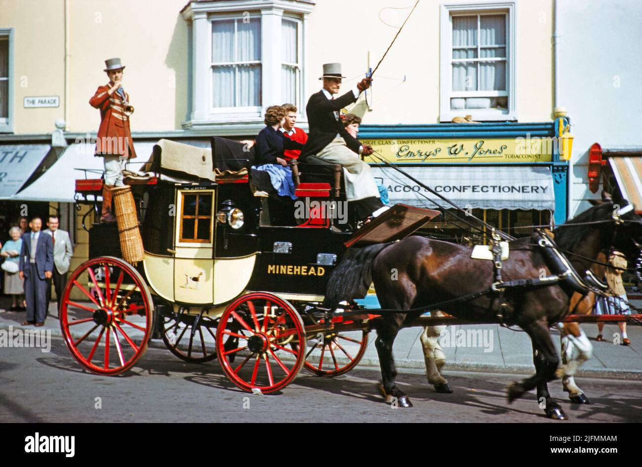The Minehead harrier stagecoach horse and carriage passing shops on The ...