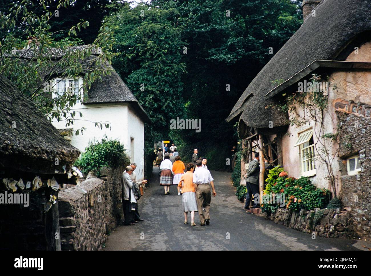 Tourists in village of Cockington, Devon, England, UK early 1960s Stock ...