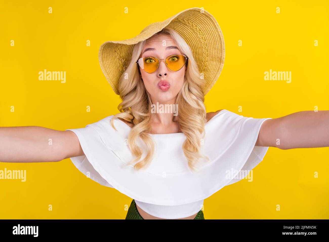 Self Portrait Of Attractive Amorous Wavy Haired Girl Sending Air Kiss