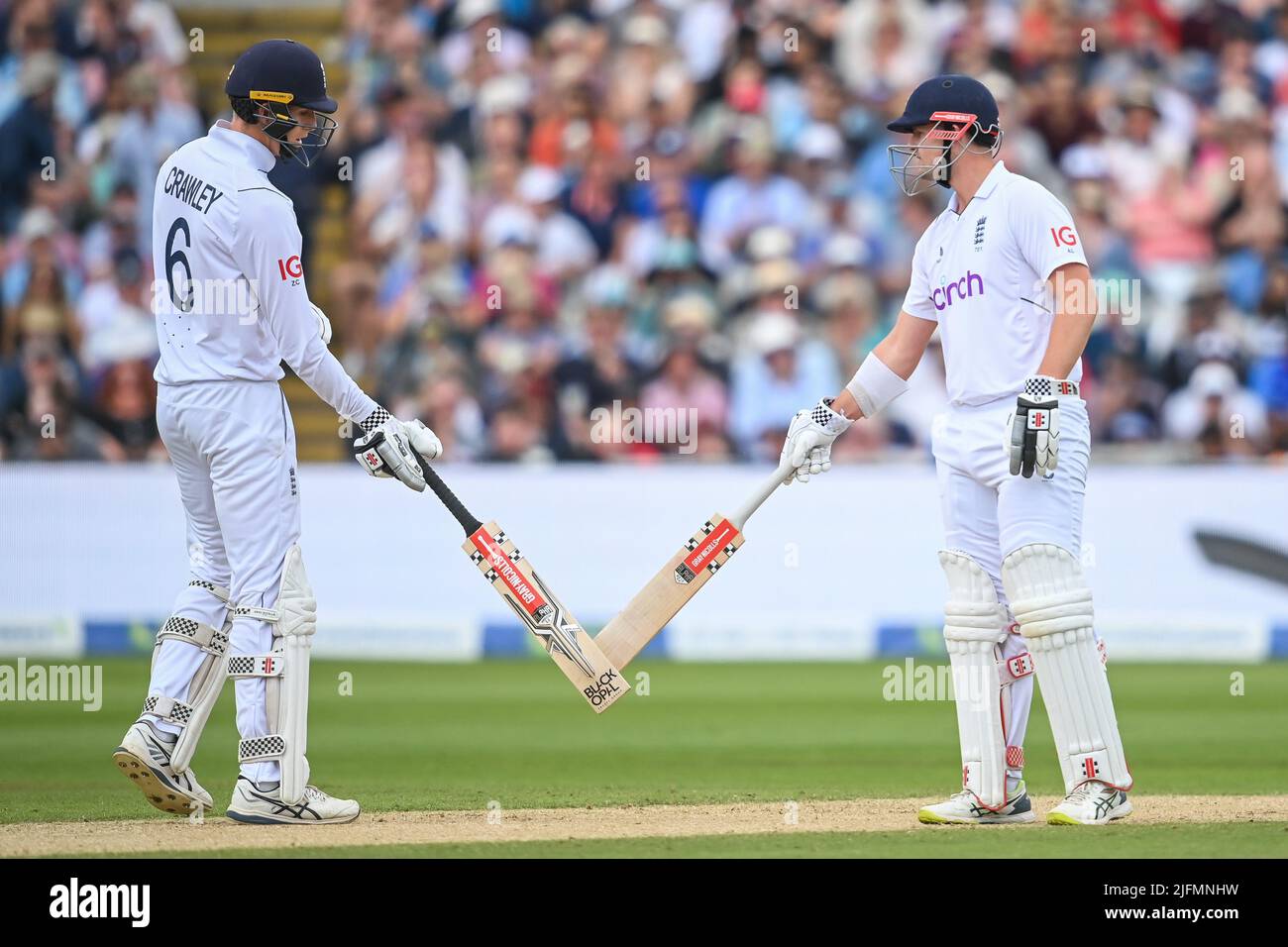 Alex Lees of England and Zak Crawley touch bats after Zak Crawley hits ...
