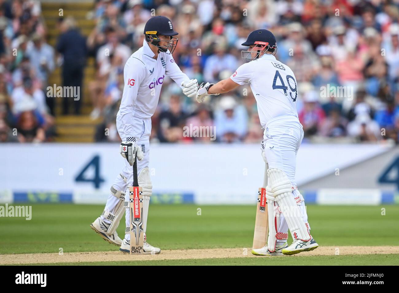 Alex Lees of England and Zak Crawley bump fists after Zak Crawley hits ...