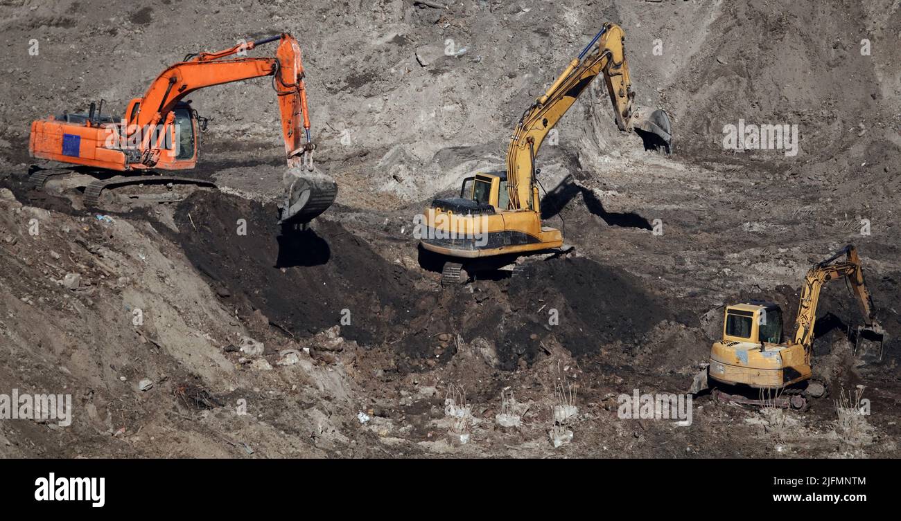Kiev, Ukraine March 13, 2019: Tractors and excavators work on the ...