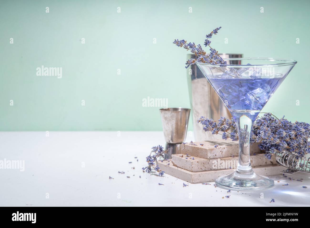 Purple lavender flower drink, margarita alcohol cocktail, with ice ...