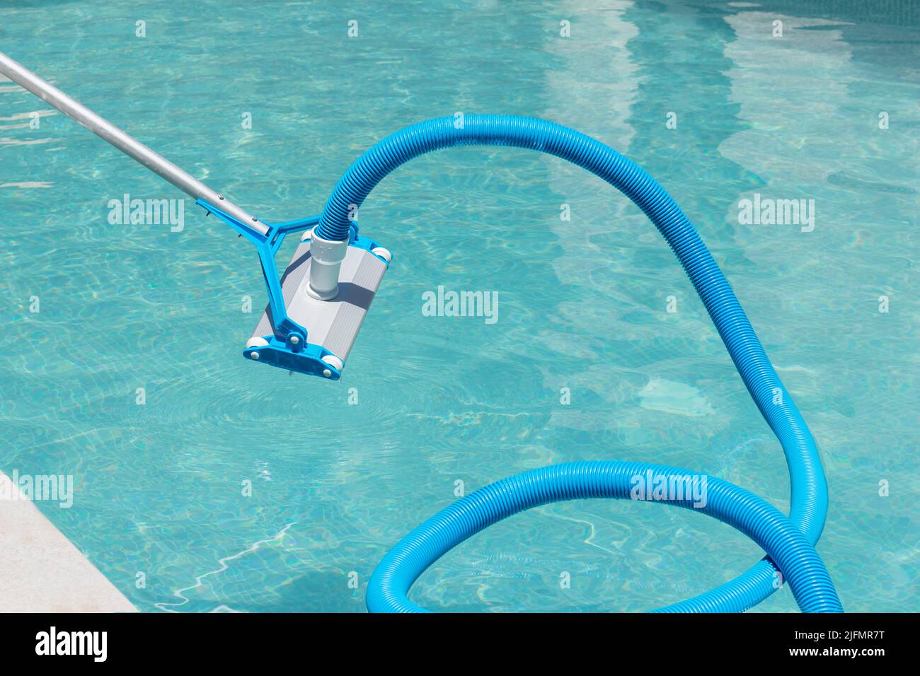 Close up view of automatic swimming pool cleaner before entering the ...