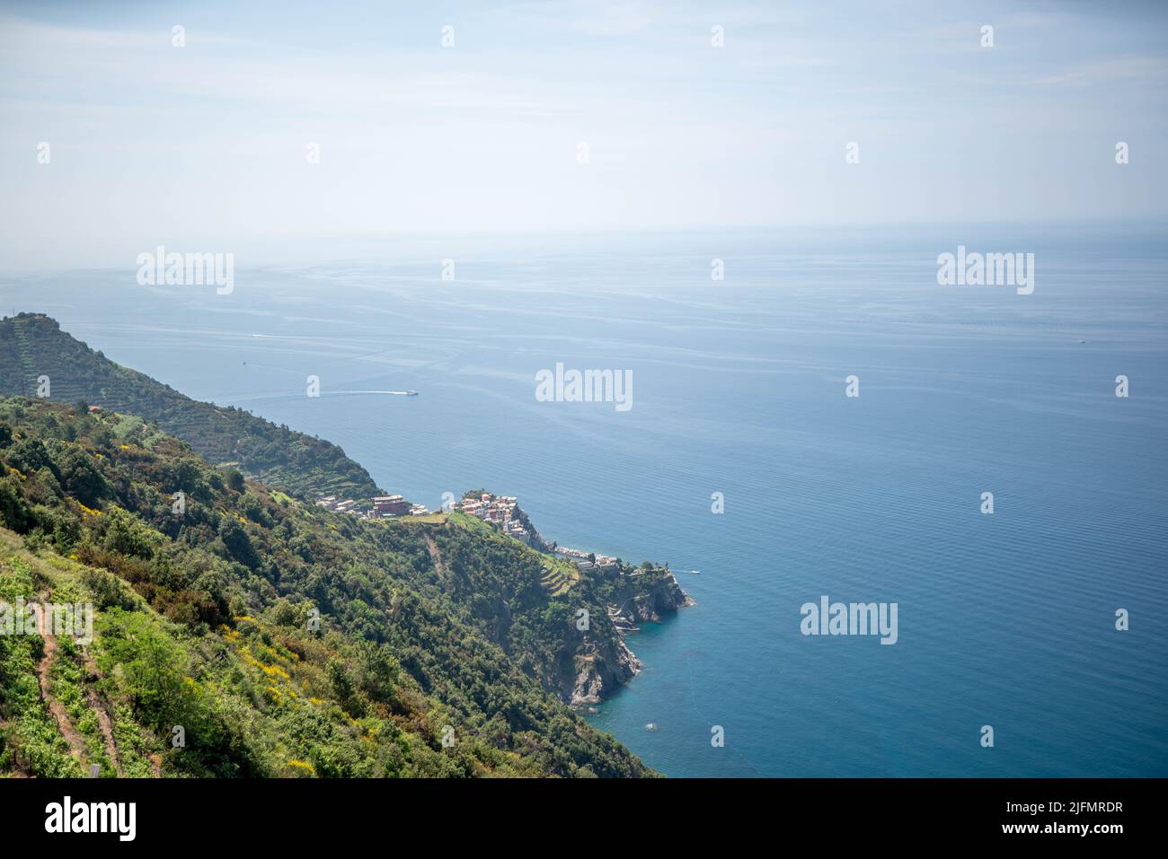 Beautiful 5 Terre landscape in Italy. Coastline and mountains covered ...