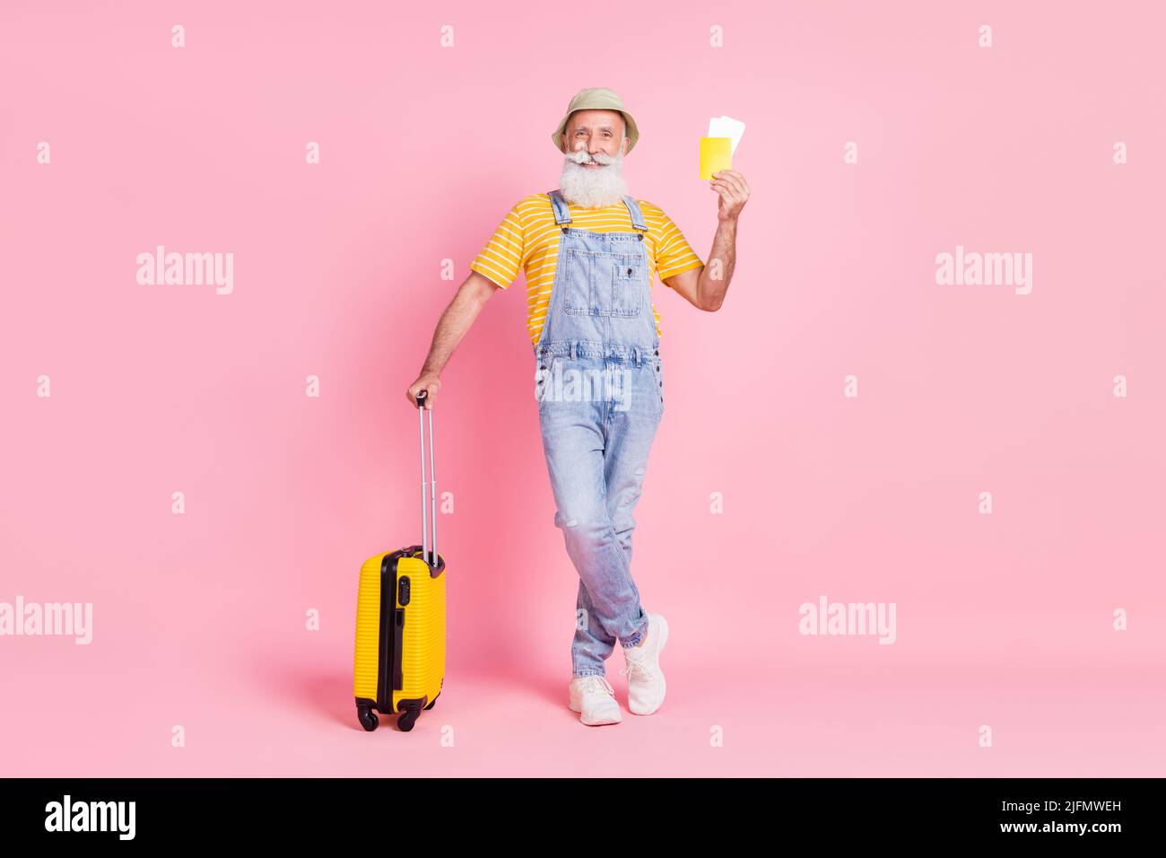 Full length body size view of attractive retired cheerful man holding ...