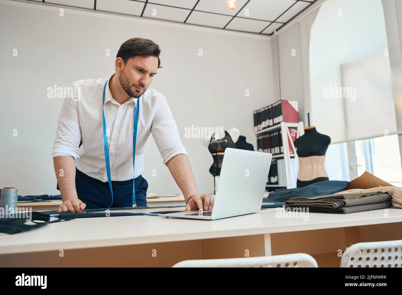 Female designer works on computer hi-res stock photography and images ...