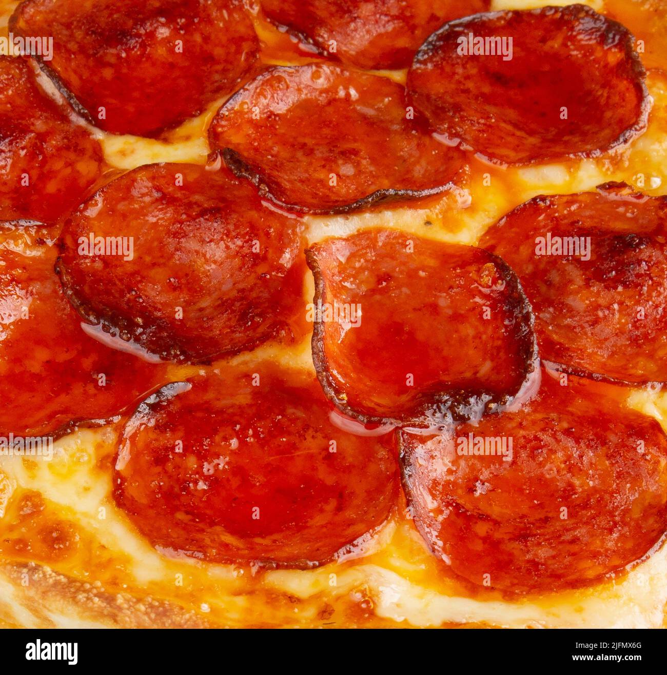 Closeup of chesse and pepperoni pizza details Stock Photo - Alamy