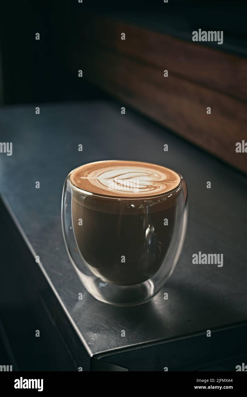 Selective focus cup of hot latte art coffee,focus at white foam Stock ...