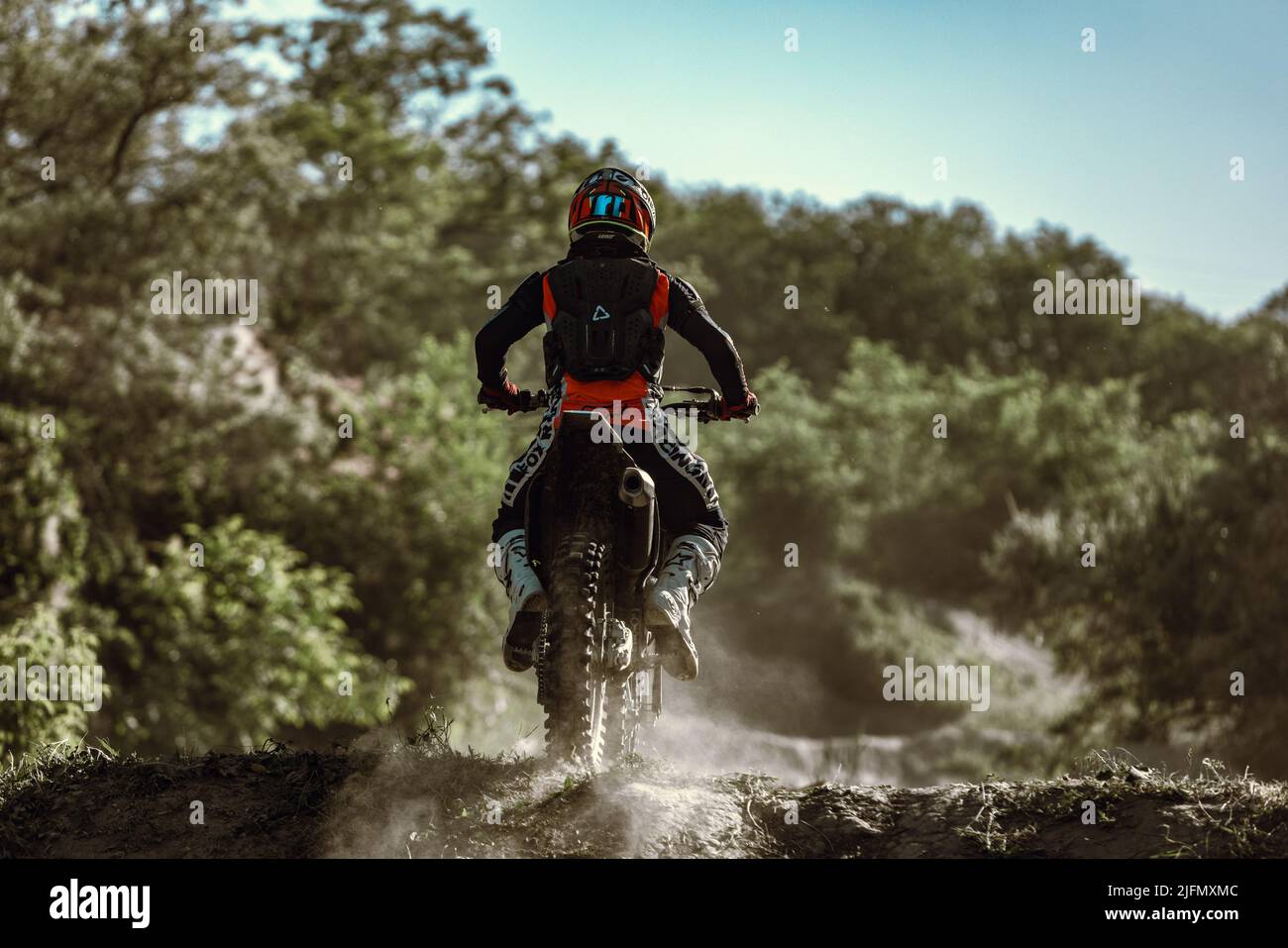 Ukrainian professional motorcycle rider driving on Enduro motorbike ...
