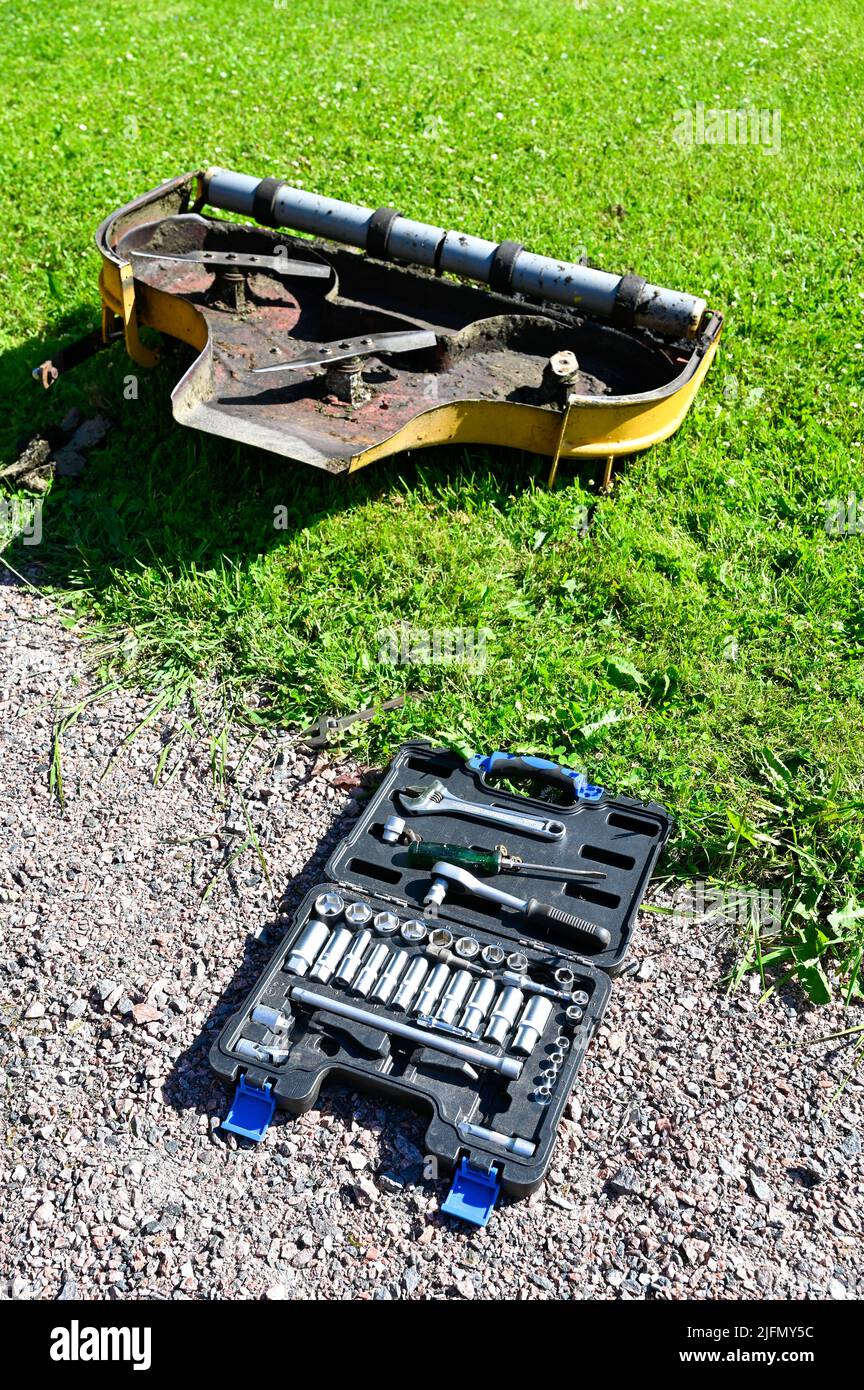 Repairing lawn mower hi-res stock photography and images - Alamy