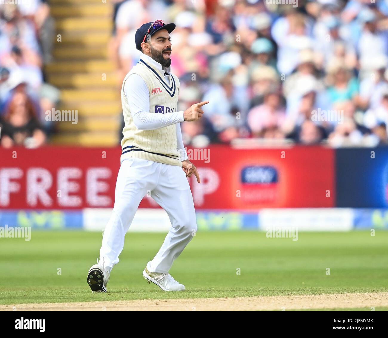 Virat Kohli of India celebrates the wicket of Zak Crawley of England ...