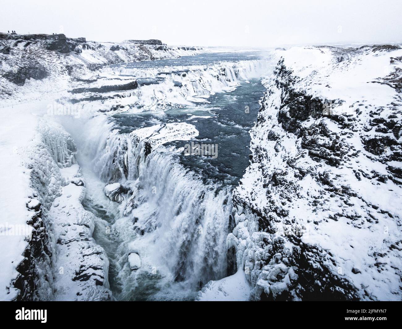 An aerial view of a low waterfall in winter Stock Photo - Alamy