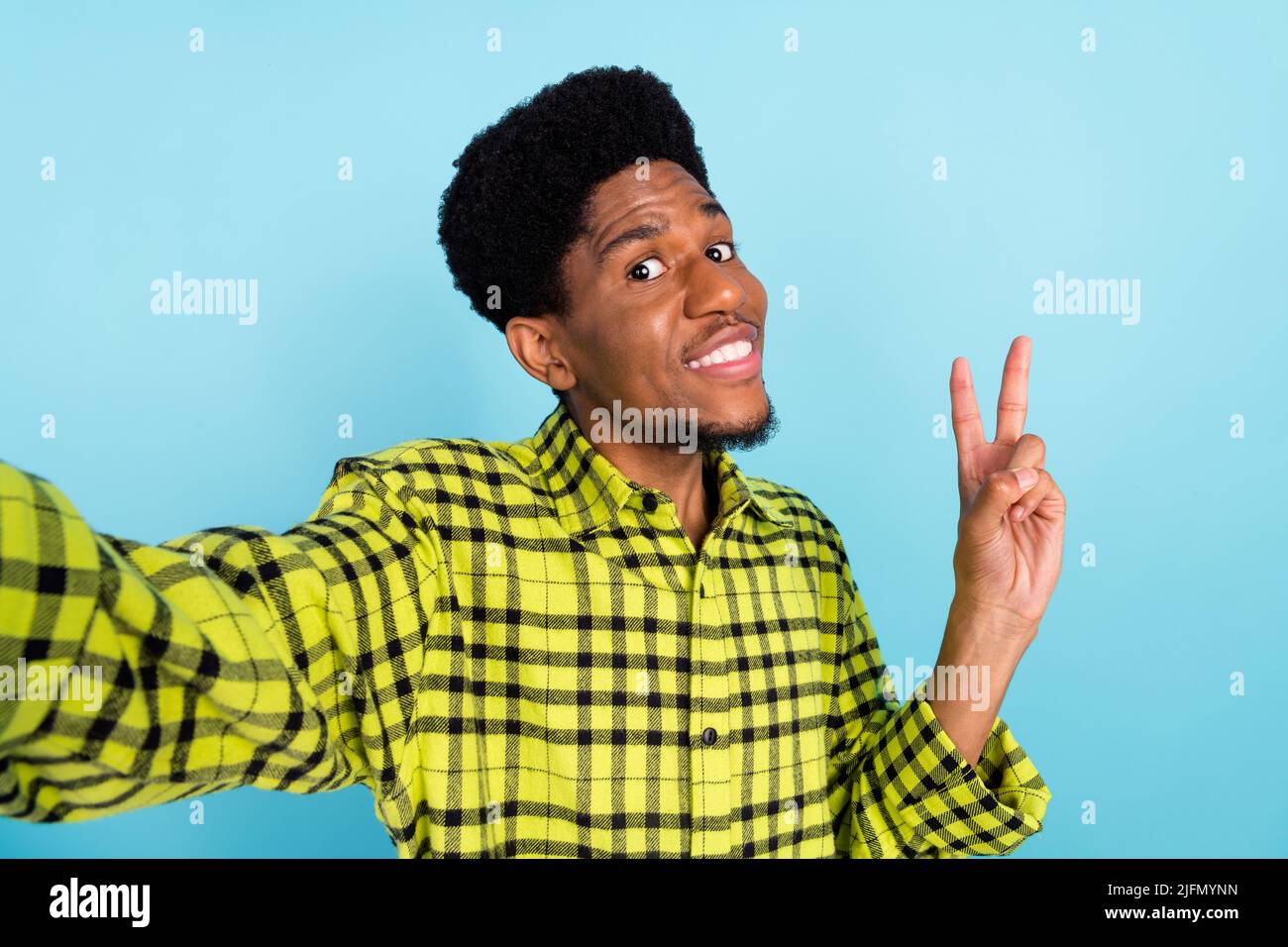 Photo of millennial brunette funny guy do selfie show v-sign wear ...