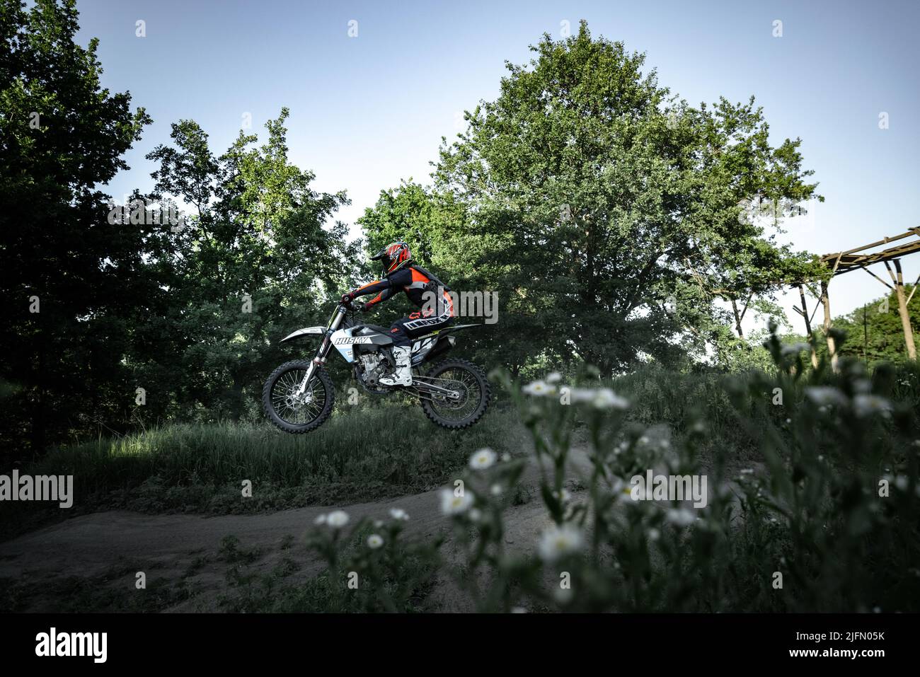 Ukrainian professional motorcycle rider driving on Enduro motorbike ...