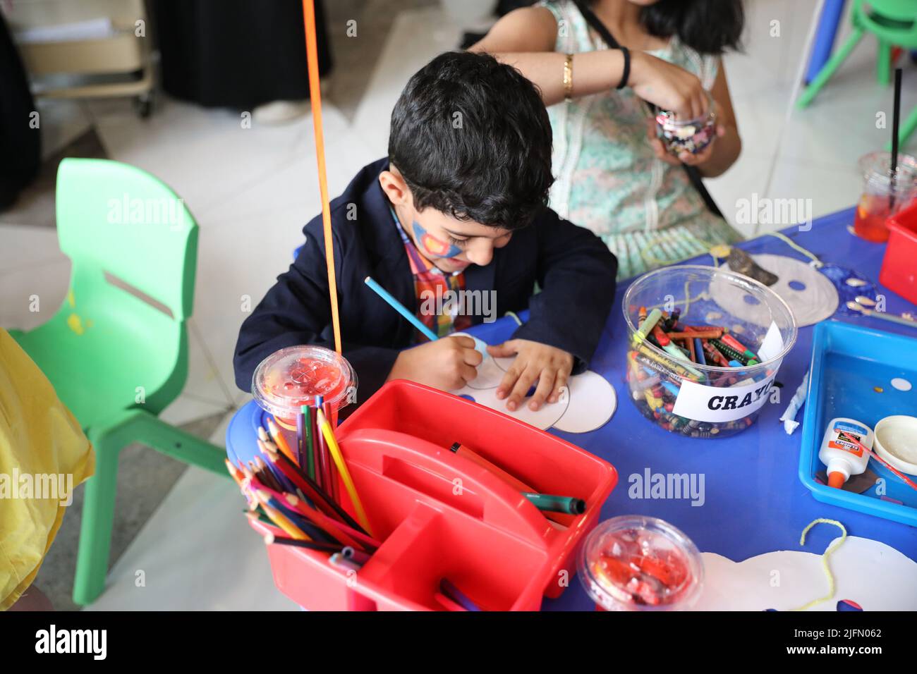 Children coloring classroom hi-res stock photography and images - Alamy