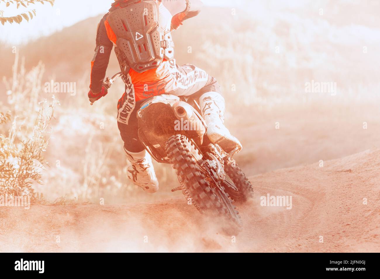 Ukrainian professional motorcycle rider driving on Enduro motorbike ...