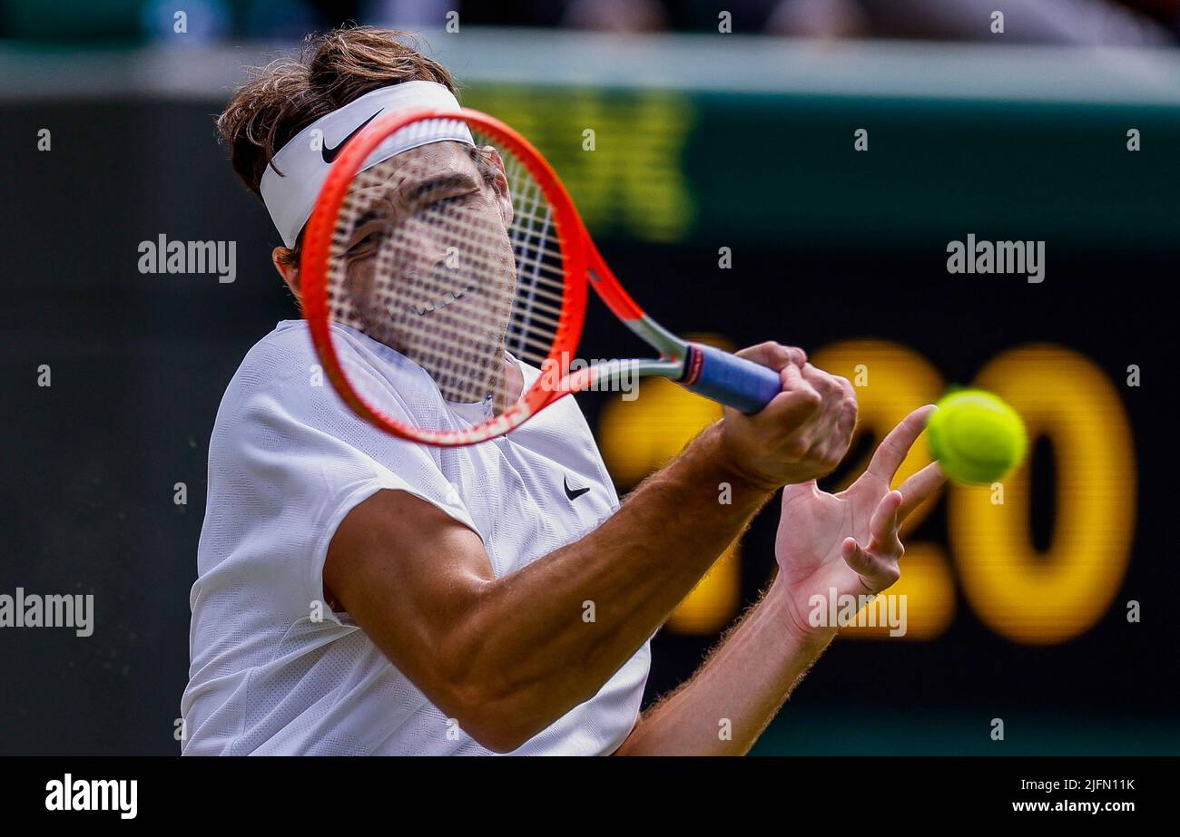 Taylor Fritz in action on day eight of the 2022 Wimbledon Championships ...