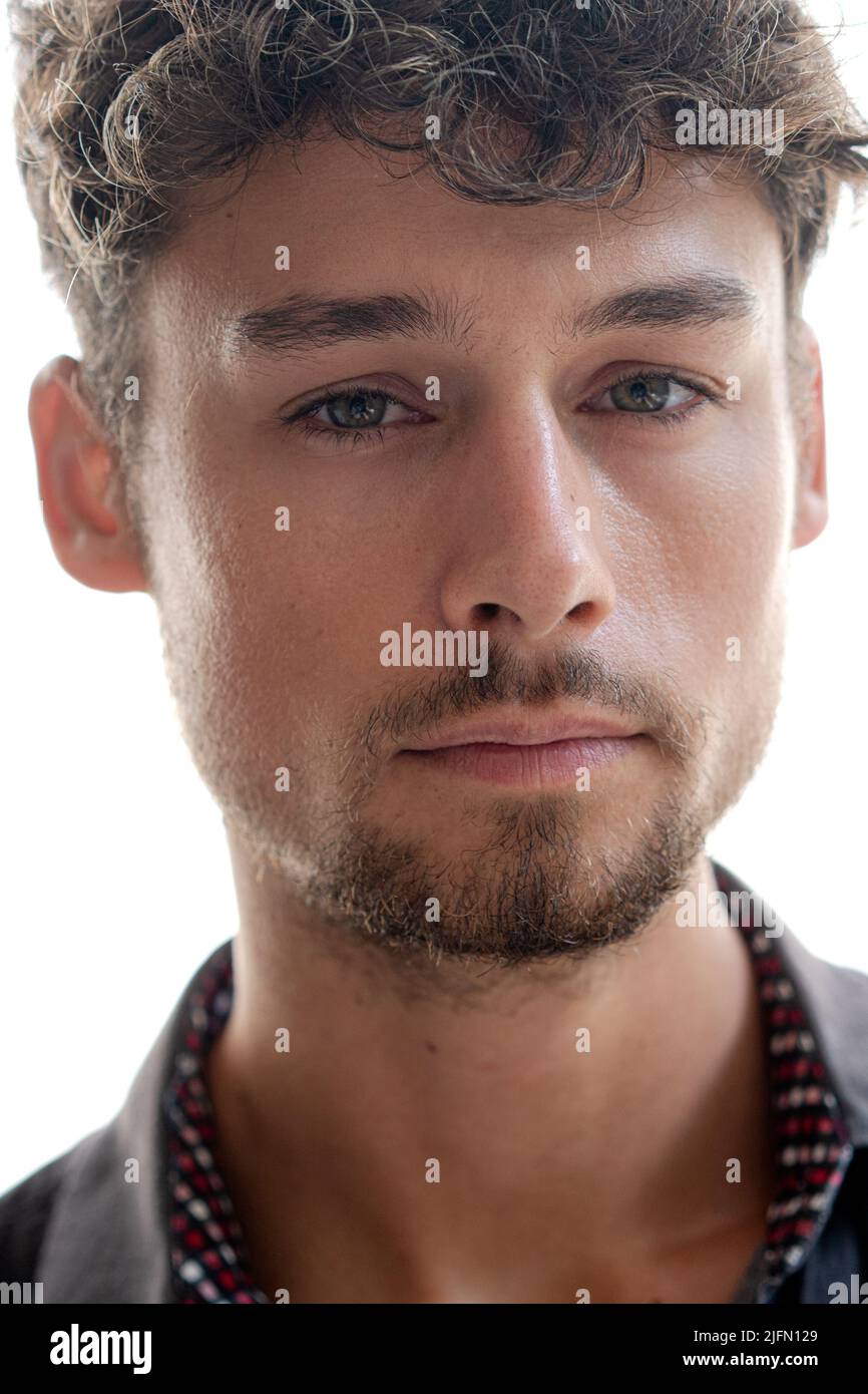 Simple portrait of a young handsome man Stock Photo - Alamy