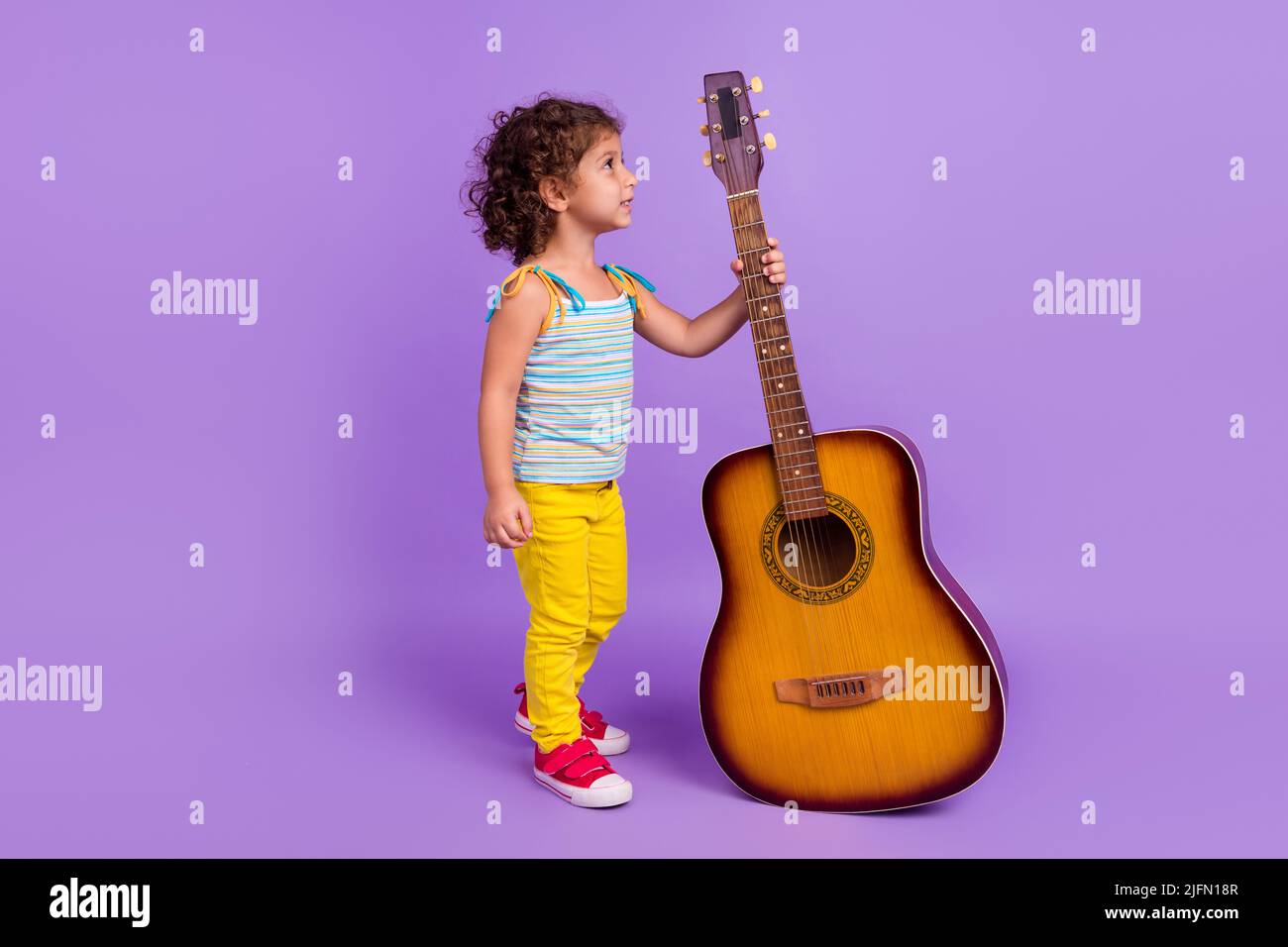 Full length profile photo of cute small brunette girl with guitar wear ...