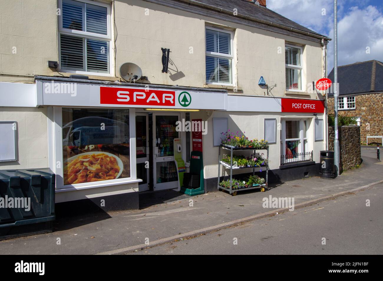 BAMPTON, DEVON, UK - APRIL 7, 2022 Bampton Post Office and stores on ...