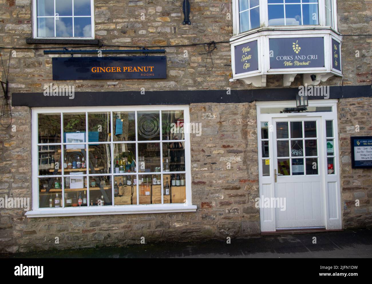BAMPTON, DEVON, UK - APRIL 7, 2022 Corks and Cru wine merchant on Fore ...