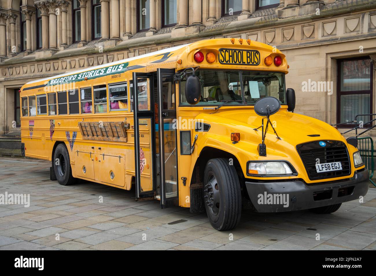 An American style yellow school bus, in the UK, used as the Bradford ...