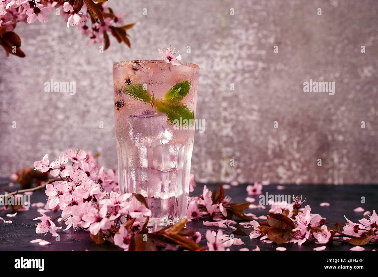 Spring cocktail. lemonade with ice and mint Stock Photo - Alamy