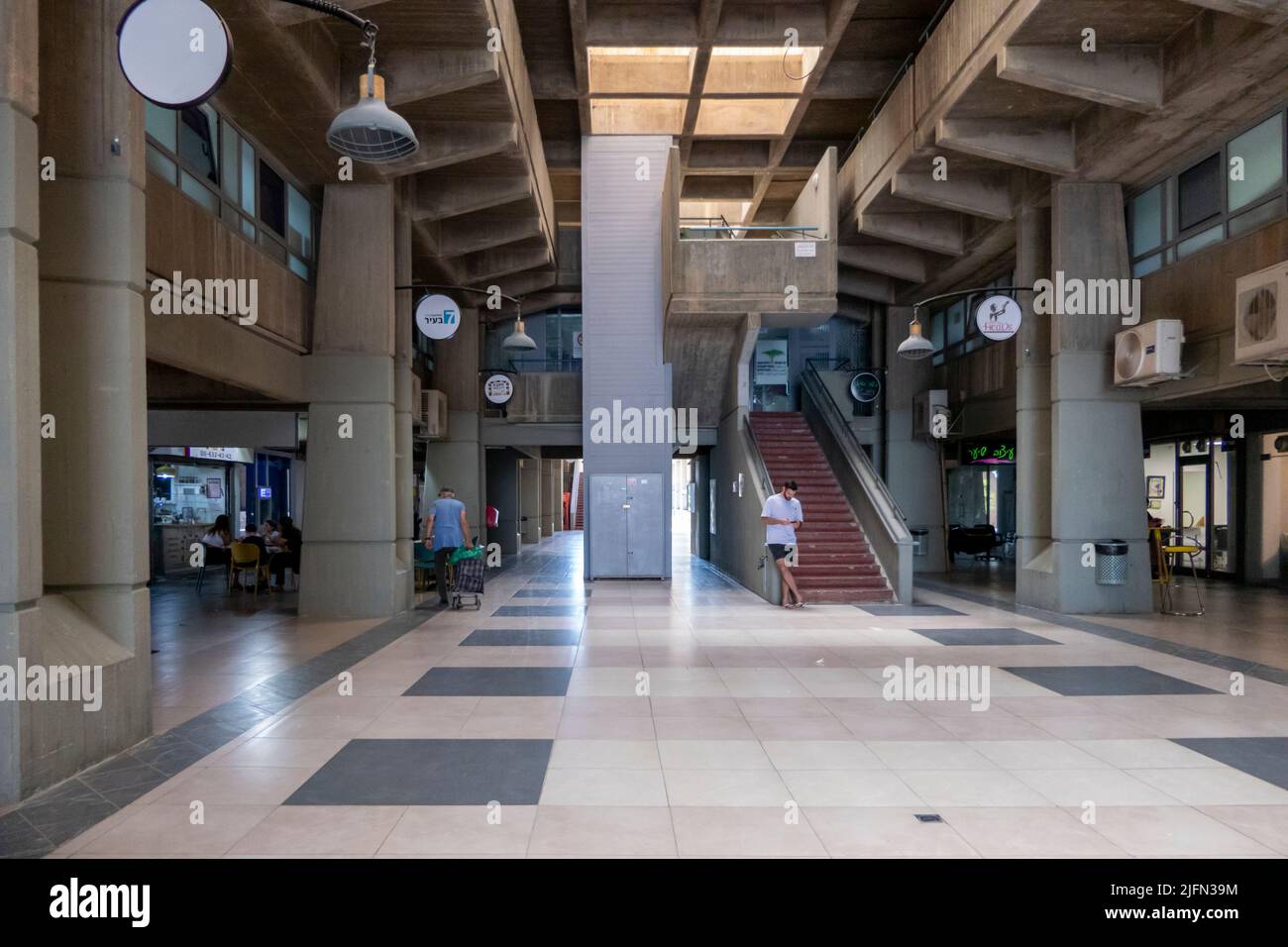 A shopping center built in Brutalist architecture style in Beersheba ...