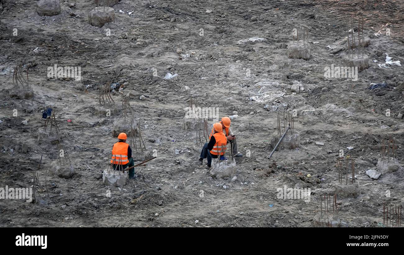 Kiev, Ukraine March 13, 2019: Workers - zero-cycle construction of the ...