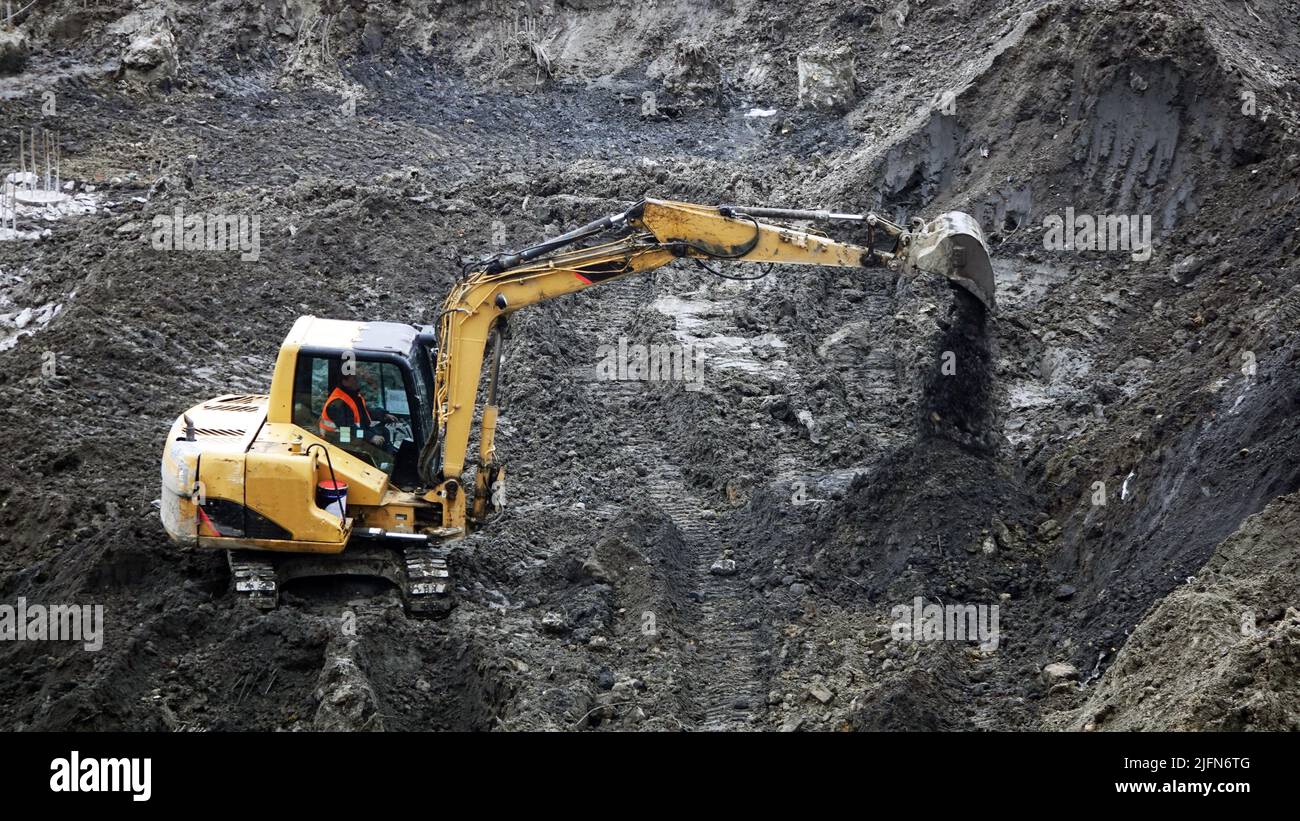 Kiev, Ukraine March 13, 2019: Tractors and excavators work on the ...