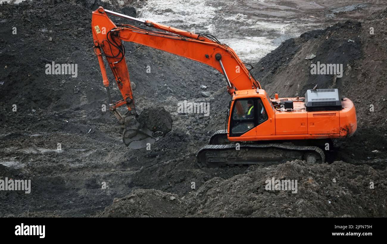 Kiev, Ukraine March 13, 2019: Tractors and excavators work on the ...