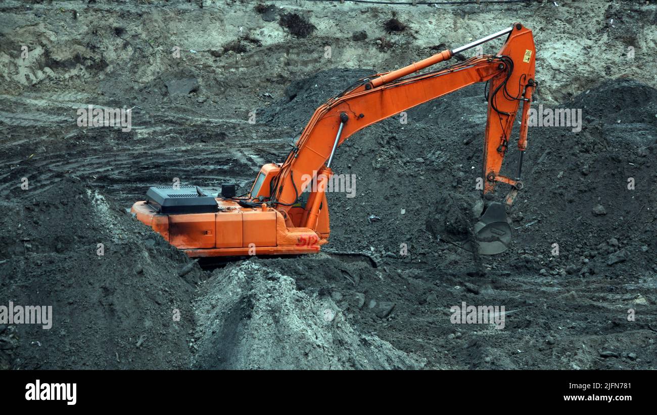 Kiev, Ukraine March 13, 2019: Tractors and excavators work on the ...