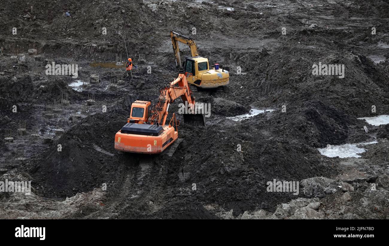 Kiev, Ukraine March 13, 2019: Tractors and excavators work on the ...