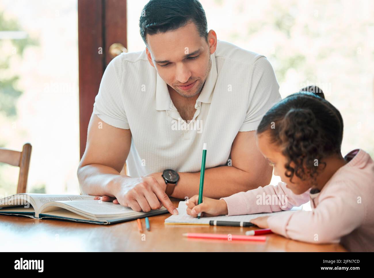 Mixed Race Father Helping His Daughter With Her Homework Dad Teaching