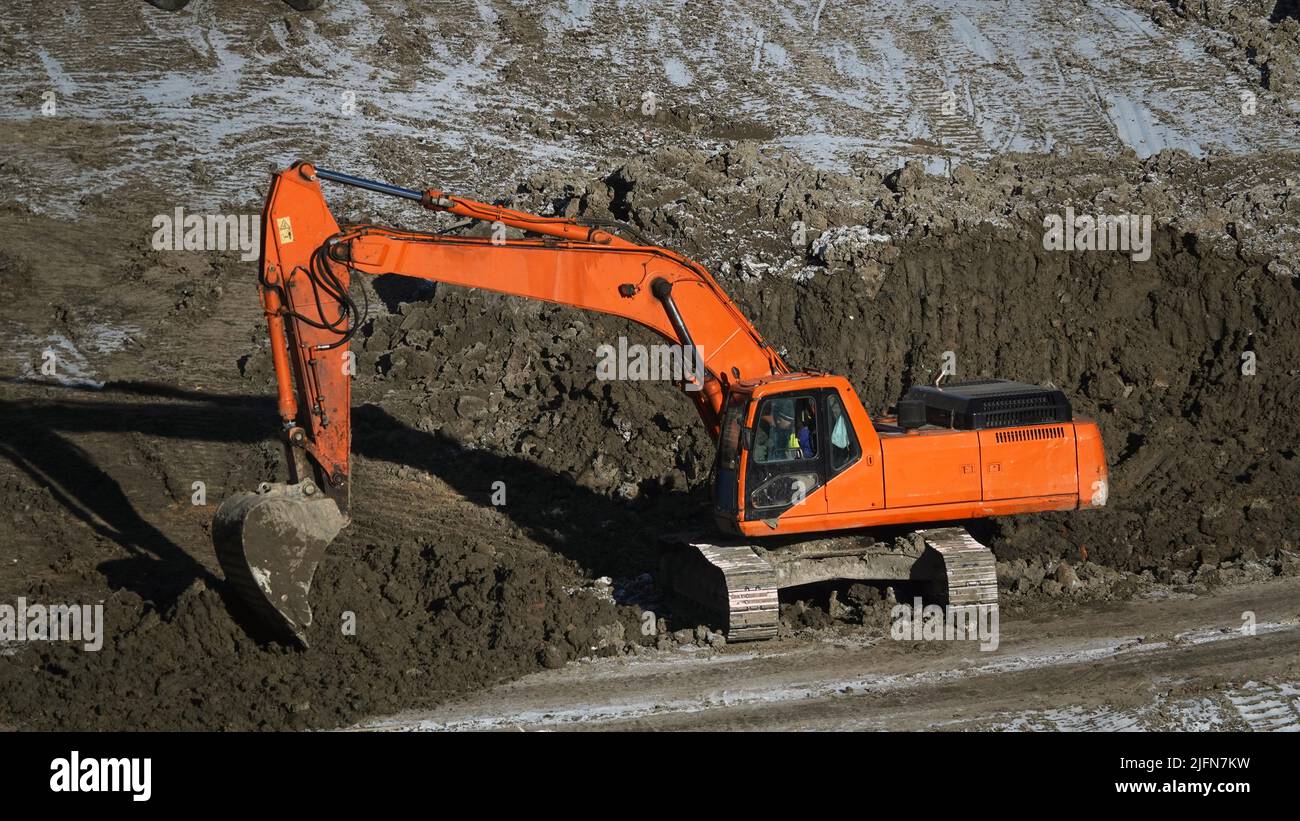 Kiev, Ukraine March 13, 2019: Tractors and excavators work on the ...