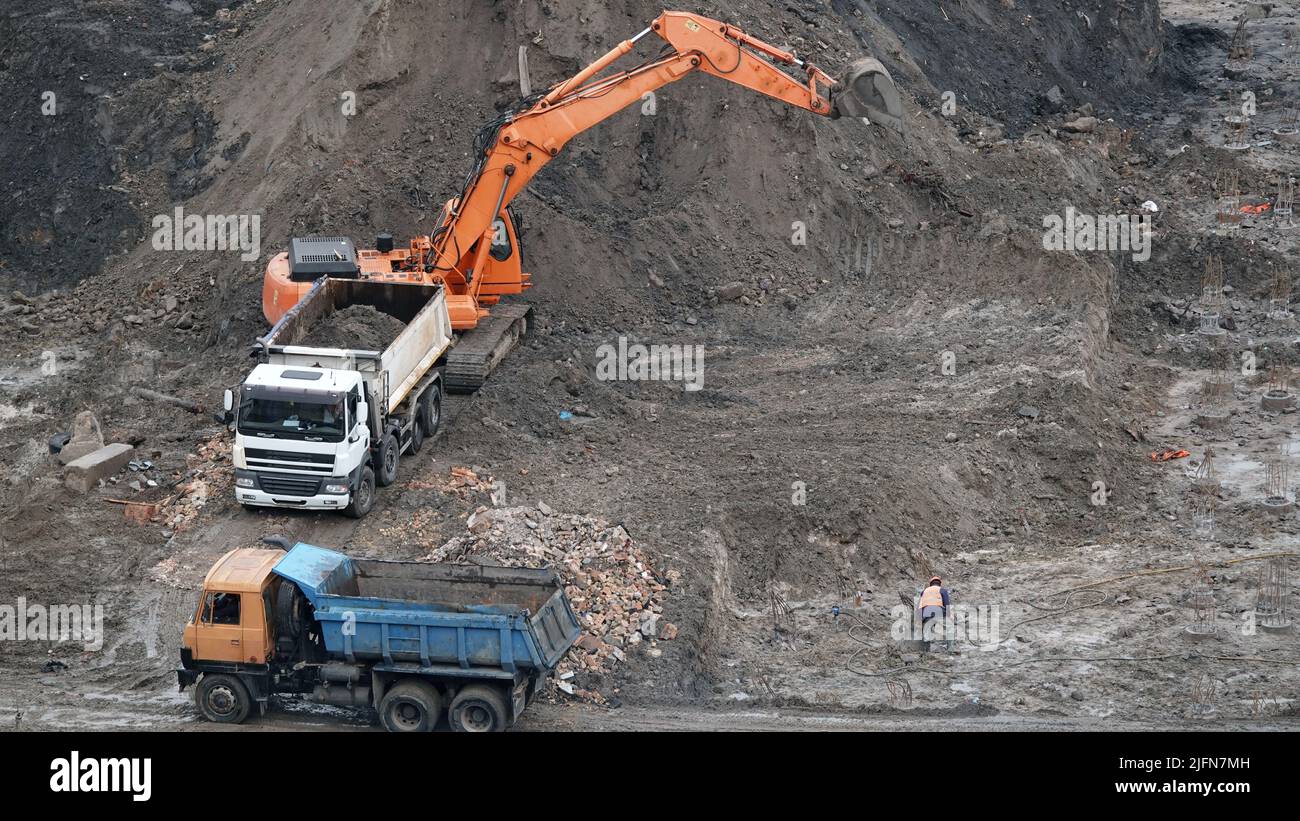 Kiev, Ukraine March 13, 2019: Tractors and excavators work on the ...