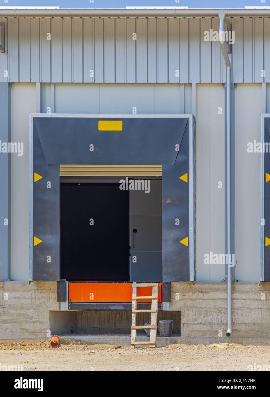 Wooden Ladder at Loading Dock Door Warehouse Building Stock Photo - Alamy