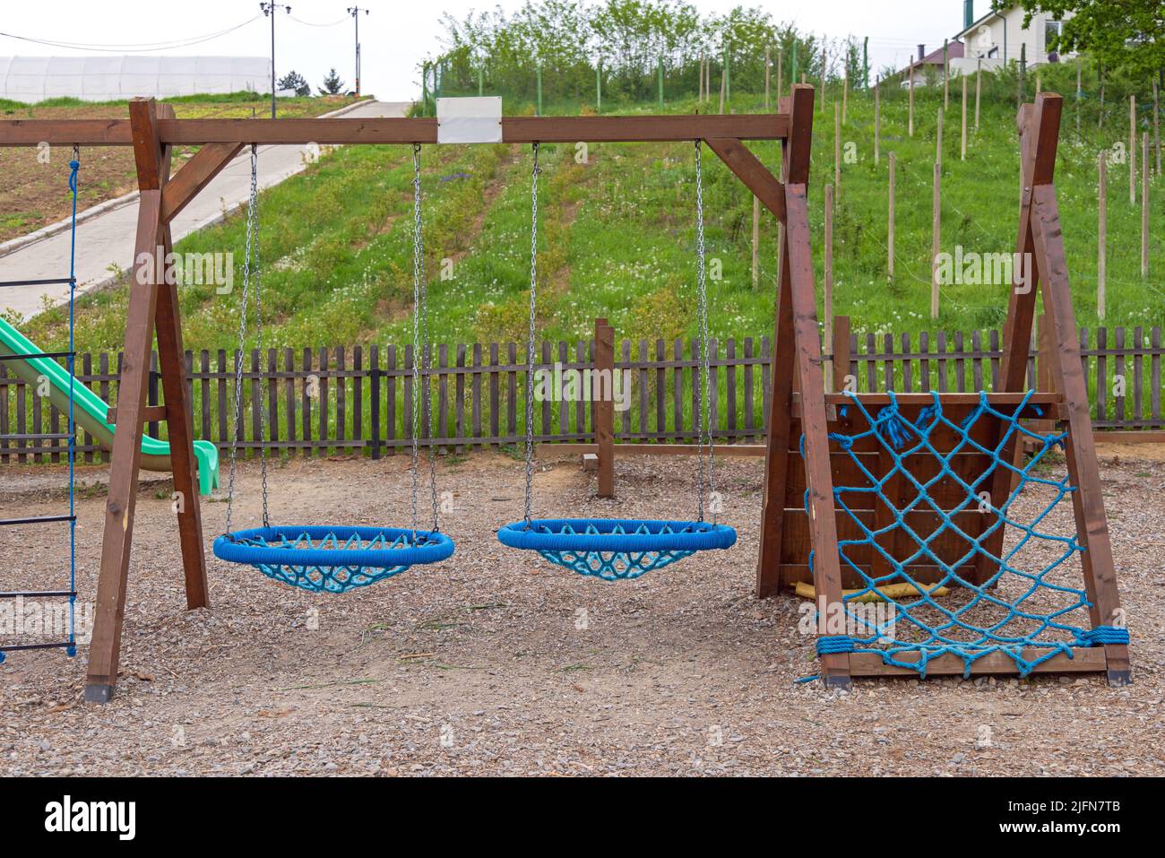 Round Swings Blue Cargo Rope Net at Kids Climbing Playground Fun Stock ...