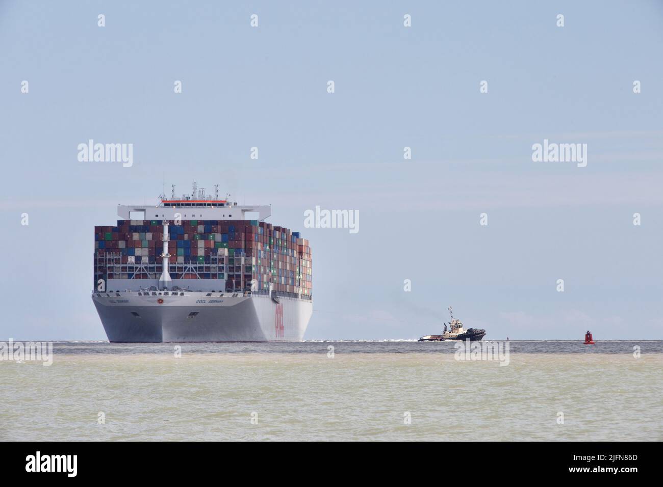 Container ship docking at the Port of Felixstowe, Suffolk, UK Stock ...