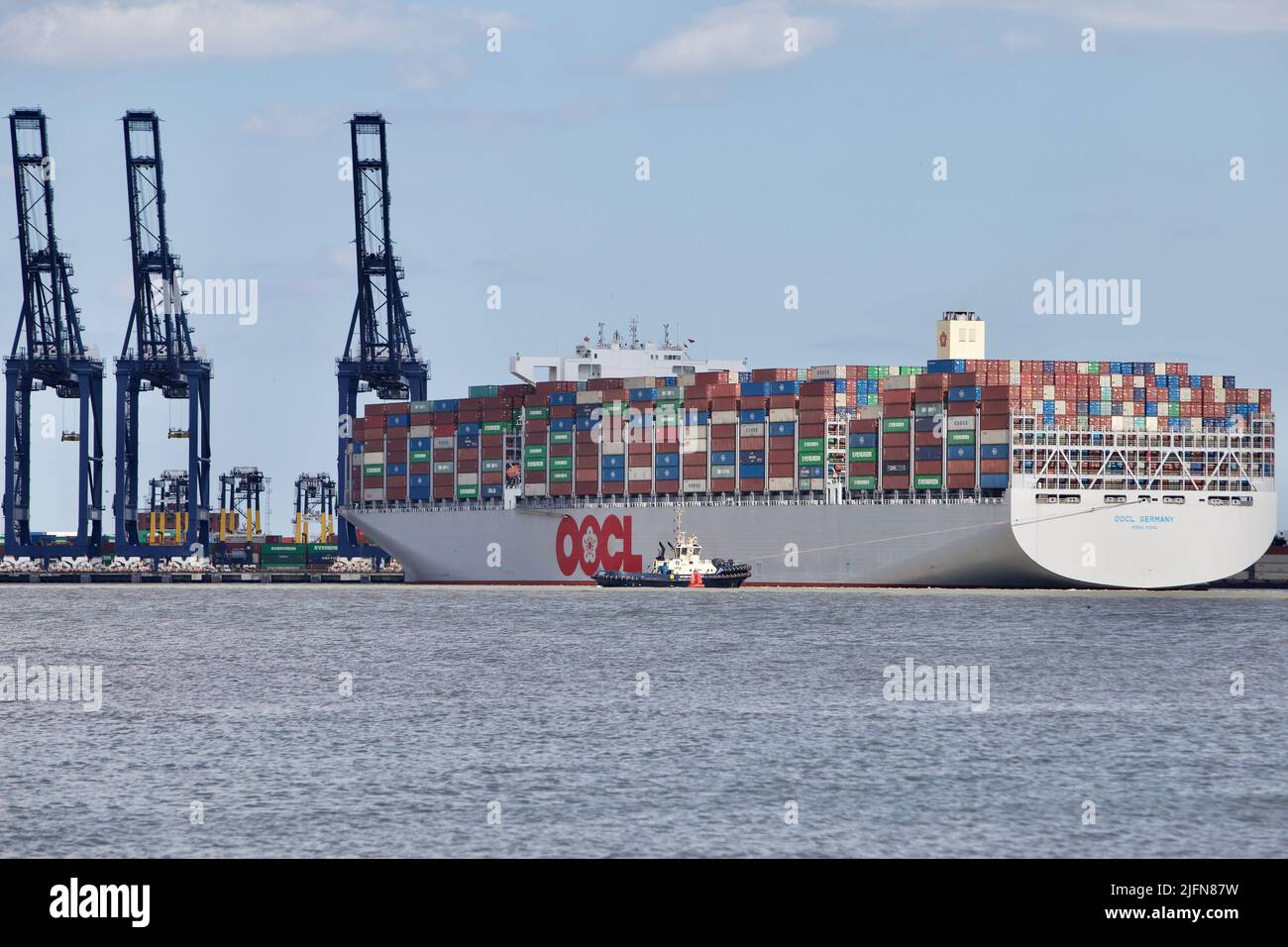 Container ship docking at the Port of Felixstowe, Suffolk, UK Stock ...
