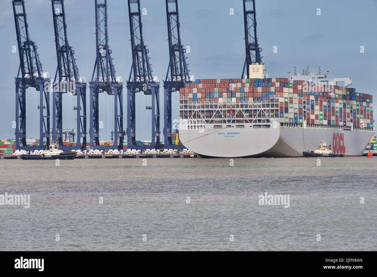 Container ship docking at the Port of Felixstowe, Suffolk, UK Stock ...