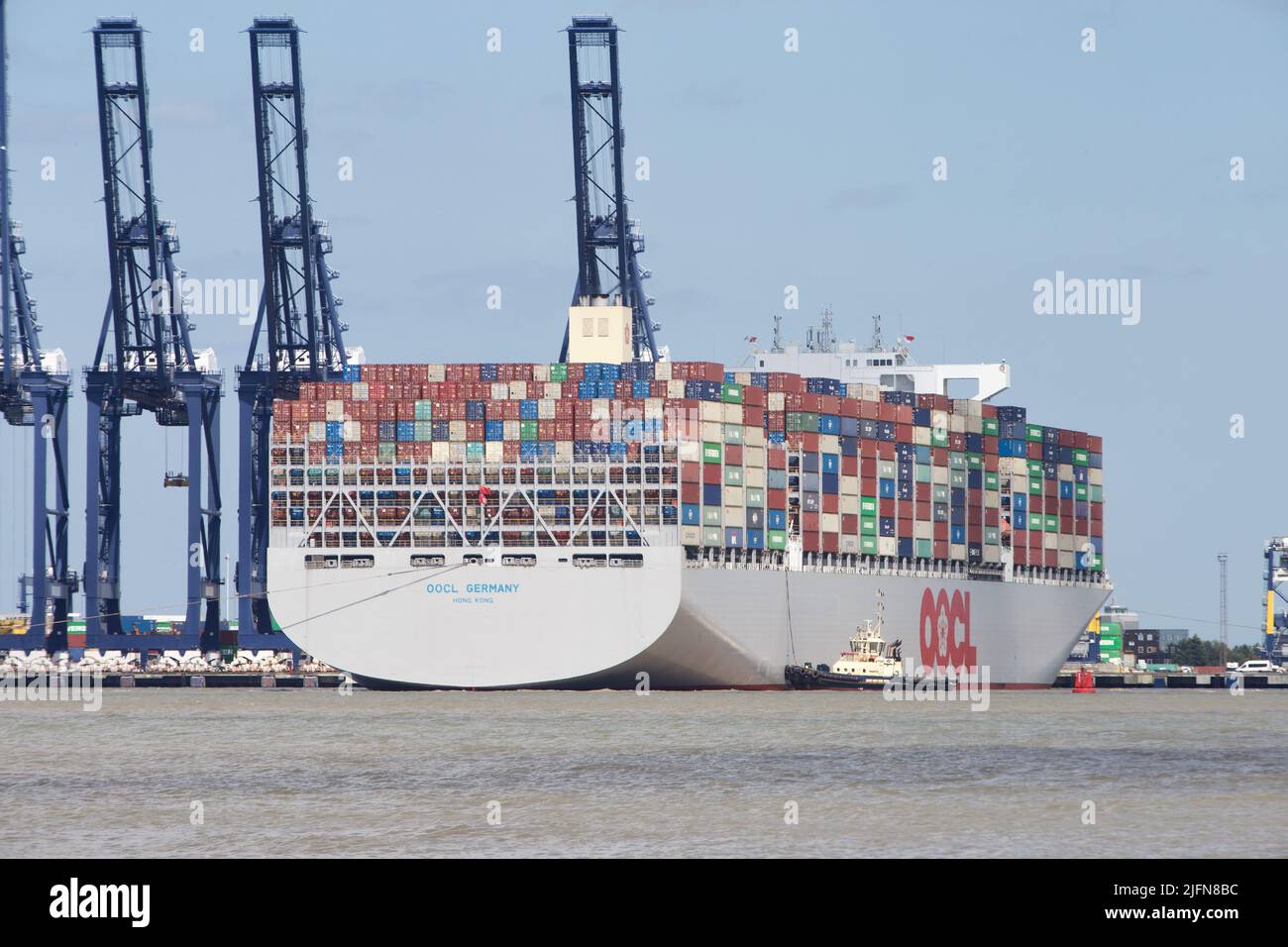 Container ship docking at the Port of Felixstowe, Suffolk, UK Stock ...