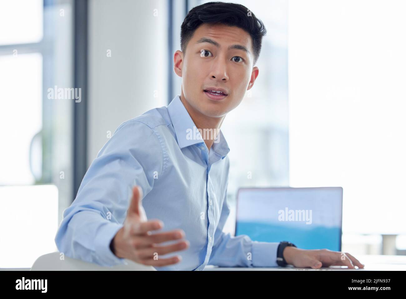 Professional businessman turning around looking hi-res stock ...