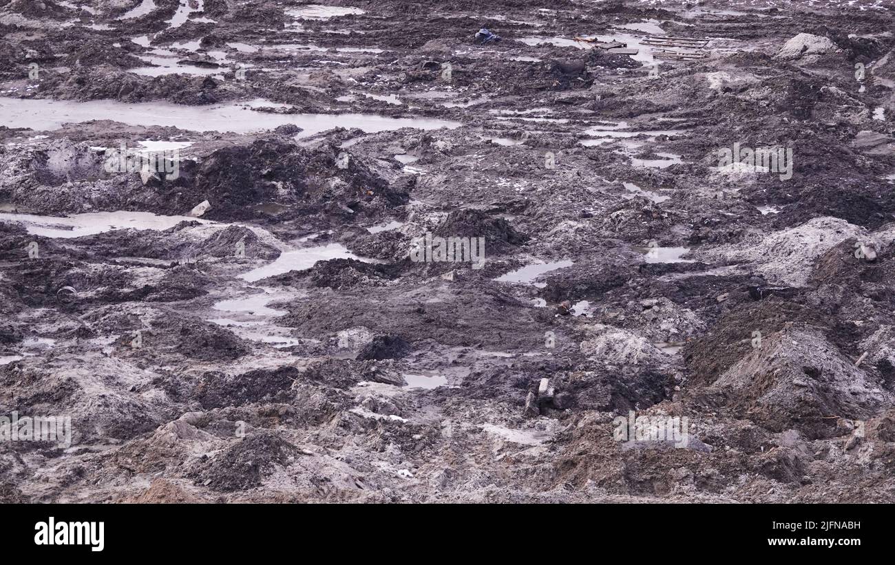 Kiev, Ukraine, October 17, 2018: Workers in the mud of a construction ...